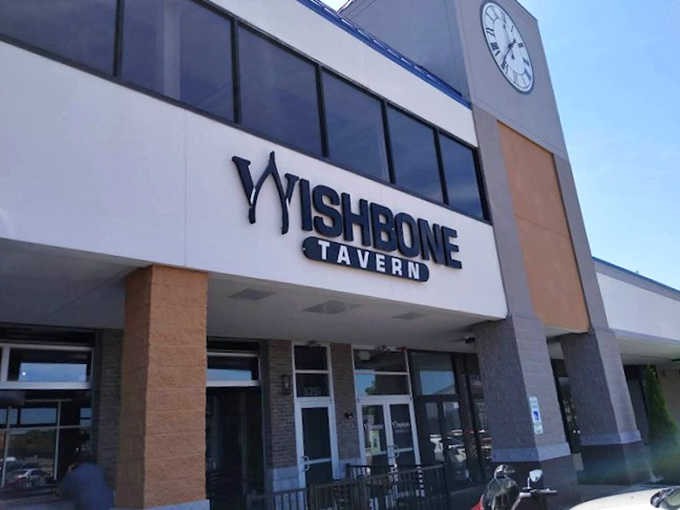 The unassuming storefront of Wishbone Tavern hides culinary treasures within, like a delicious secret waiting to be discovered.