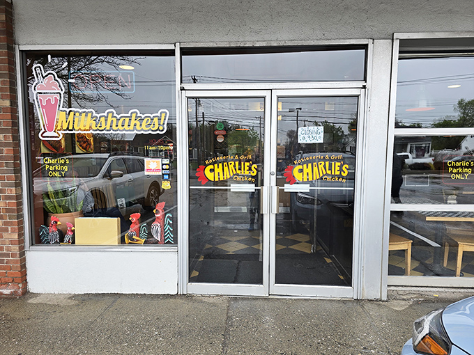 Charlie's storefront beckons with its unpretentious charm and neon "Milkshakes!" sign &ndash; a humble exterior hiding barbecue greatness within.