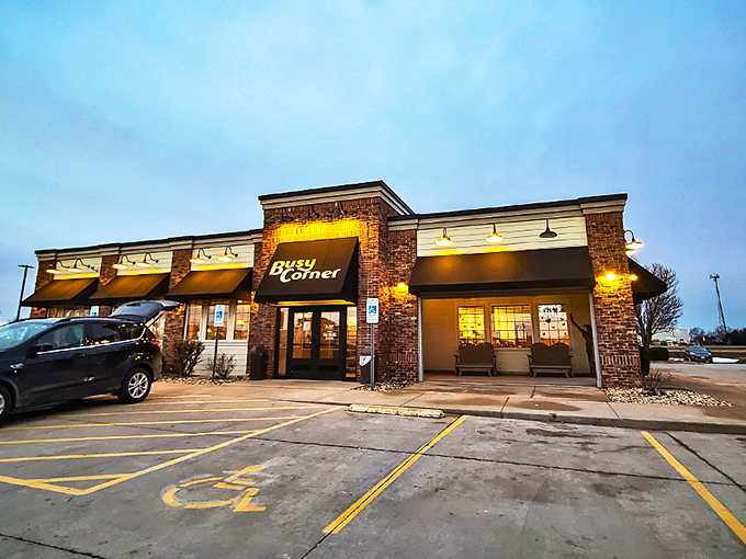Busy Corner's welcoming exterior glows at dusk, a beacon of comfort food paradise amid the Illinois countryside.