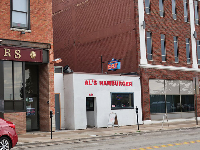 A humble white storefront with bold red letters &ndash; Al's Hamburger might be easy to miss, but impossible to forget once you've tasted their legendary burgers.