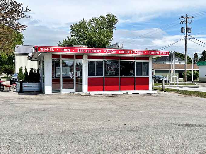 The iconic red-and-white exterior of Ray's Drive-In stands as a beacon of authentic American fast food, promising simple pleasures done extraordinarily well.