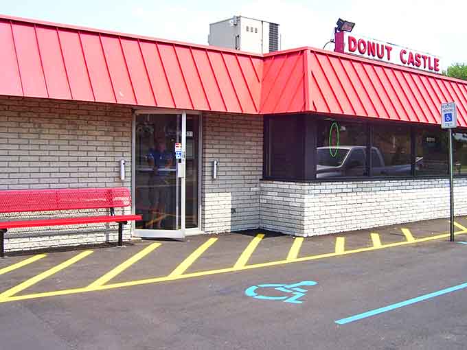 That bright red roof isn't just eye-catching, it's a beacon guiding you toward some of the finest bagel sandwiches in Michigan, hiding behind a name that undersells the savory magic happening inside.