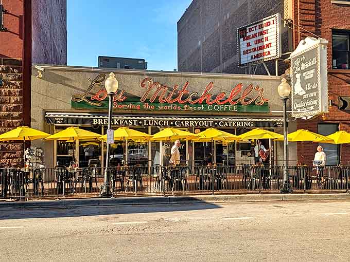 That vintage signage and those cheerful yellow umbrellas aren't just decor; they're a time machine to when diners were America's living rooms.