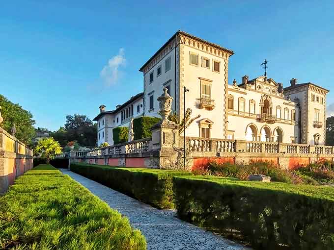 The Italian Renaissance facade gleams in Miami sunlight, like a European postcard that somehow landed in Florida's tropical embrace.