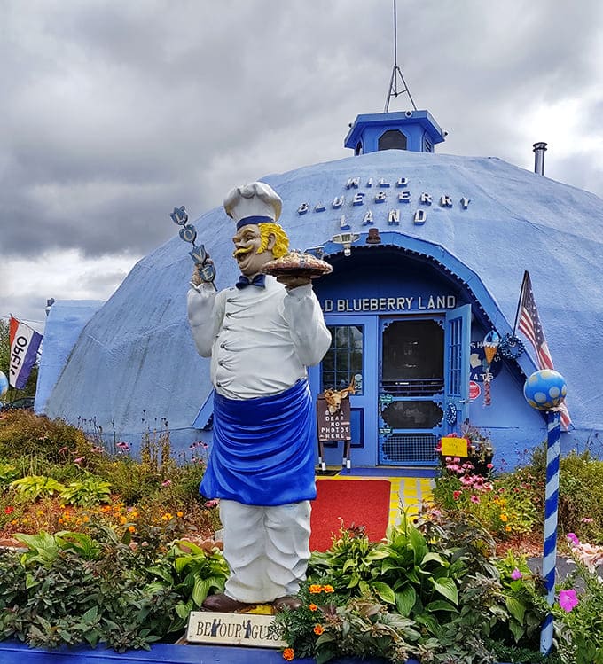 That's not a UFO landing on Route 1, it's your next favorite bakery disguised as a giant blueberry with a chef statue that's seen some things.