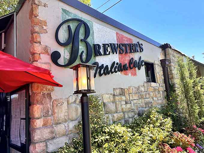 Brewster's Italian Cafe welcomes hungry souls with its rustic stone facade and subtle nod to Italy's colors – a culinary passport awaiting your arrival.