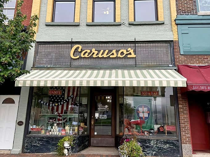 The iconic Caruso's storefront stands proudly on Dowagiac's main street, its vintage sign and striped awning beckoning sweet-toothed visitors like a sugary lighthouse.