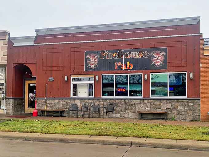 The Firehouse Pub's brick-red exterior might not scream "culinary destination," but locals know this St. Clair Shores gem houses pizza perfection.