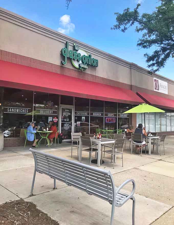 The Glass Onion Griddle welcomes hungry patrons with its inviting storefront, bright red awning, and promise of breakfast bliss in Allen Park.