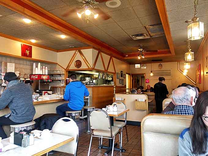Sunlight streams through the windows, illuminating booths where countless Chicago stories have unfolded over plates of eggs and endless cups of coffee.