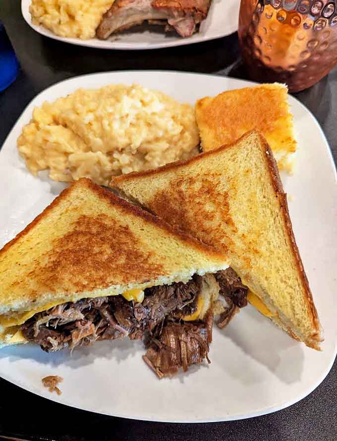 The brisket grilled cheese proves that sometimes the best innovations come from combining two perfect things into one glorious sandwich creation.