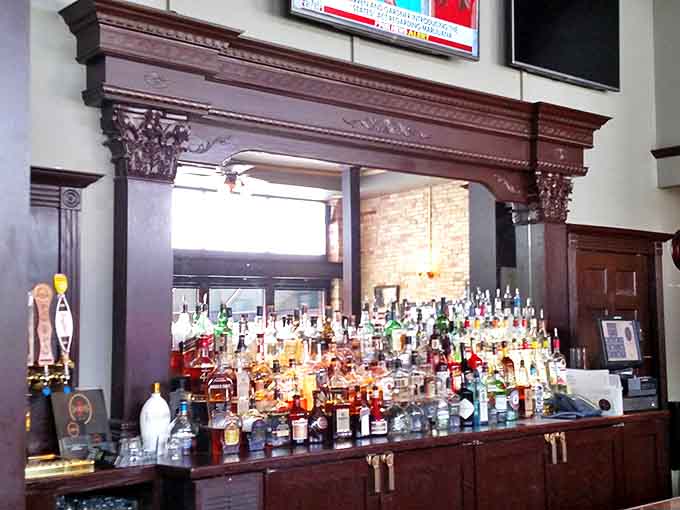 The bar area offers a front-row seat to the action, where regulars gather to catch the game and share stories over cold drinks.