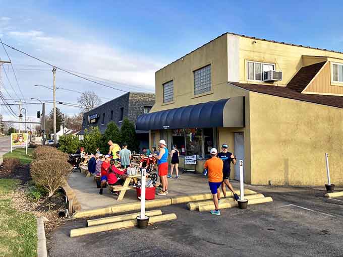 Simple picnic tables create an unpretentious outdoor dining space where pizza tastes even better with a side of fresh air.