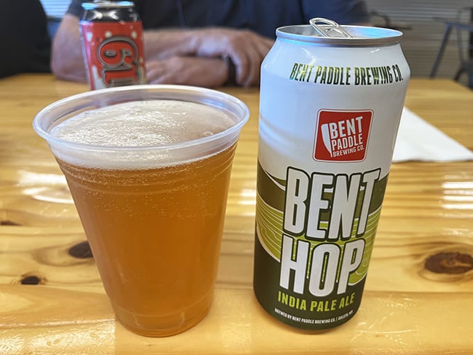 A frosty Bent Paddle brew stands at attention, ready to wash down tacos with hoppy perfection &ndash; because great food deserves equally great beverages.