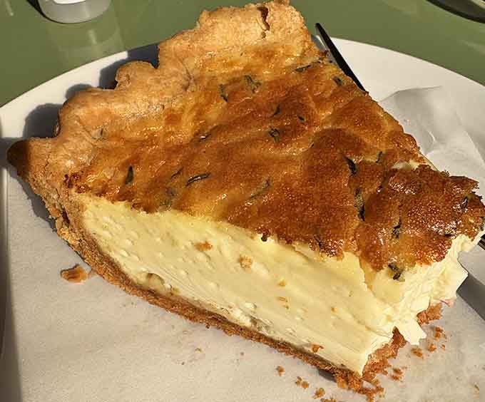 This quiche achieves that elusive perfect ratio of flaky crust to creamy filling, making lunch feel like an event.