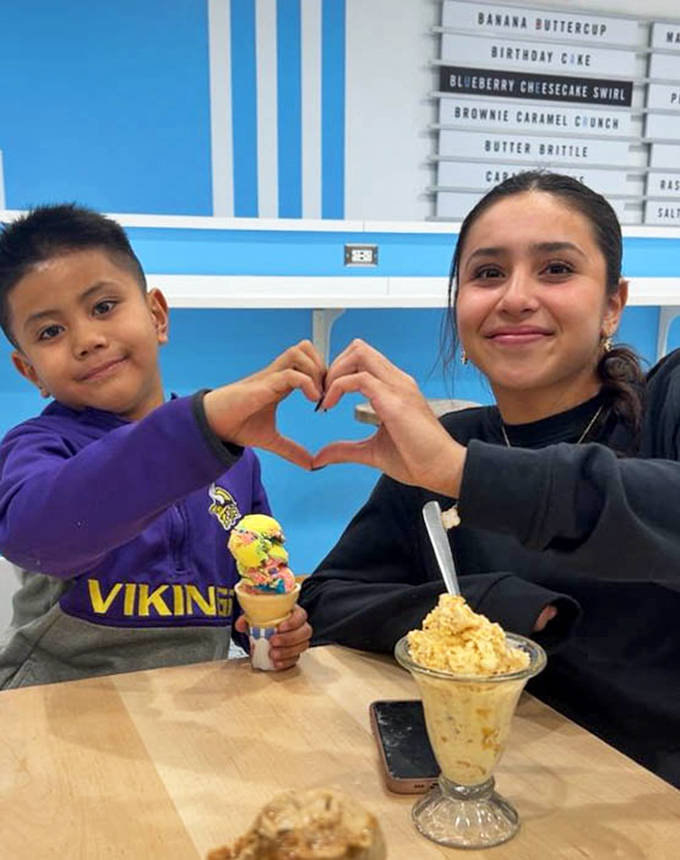 Ice cream brings people together like nothing else. That heart-shaped hand gesture says everything about the Bridgeman's experience.