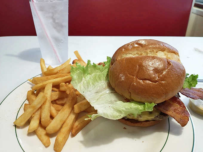 The classic burger and fries combo that reminds you why sometimes the simplest things are the hardest to perfect.