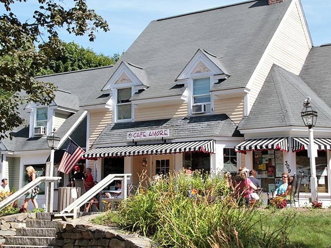 Black and white awnings shade morning coffee seekers, where breakfast conversations flow as freely as the Maine maple syrup.