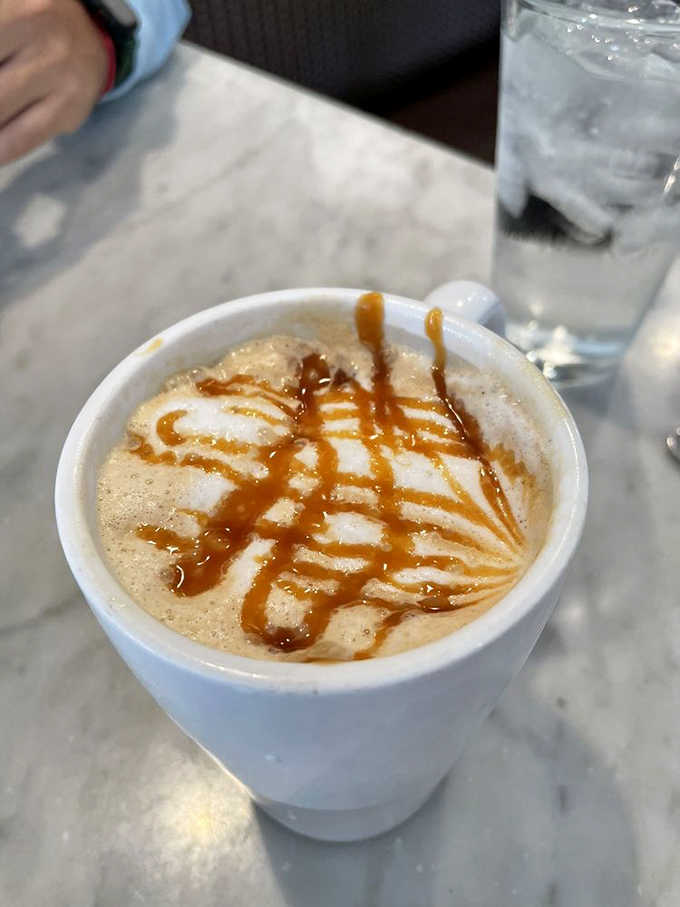 Coffee as art: a caramel macchiato with perfect crosshatching that's almost too pretty to drink. Almost.