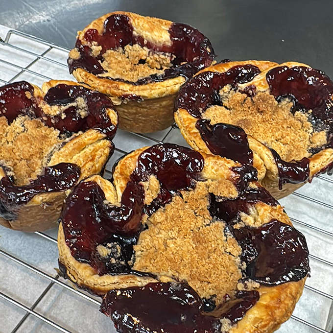 Cherry blueberry hand pies &ndash; portable pockets of joy that fit in your hand but expand in your heart. Berry perfection encased in flaky, buttery armor.