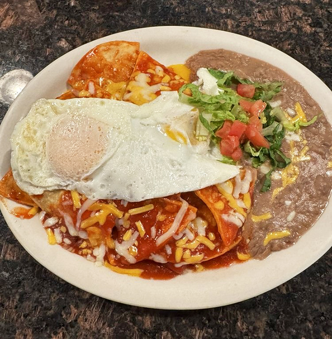 Chilaquiles that strike that perfect balance between crisp and tender – breakfast nachos that went to culinary school and graduated with honors.