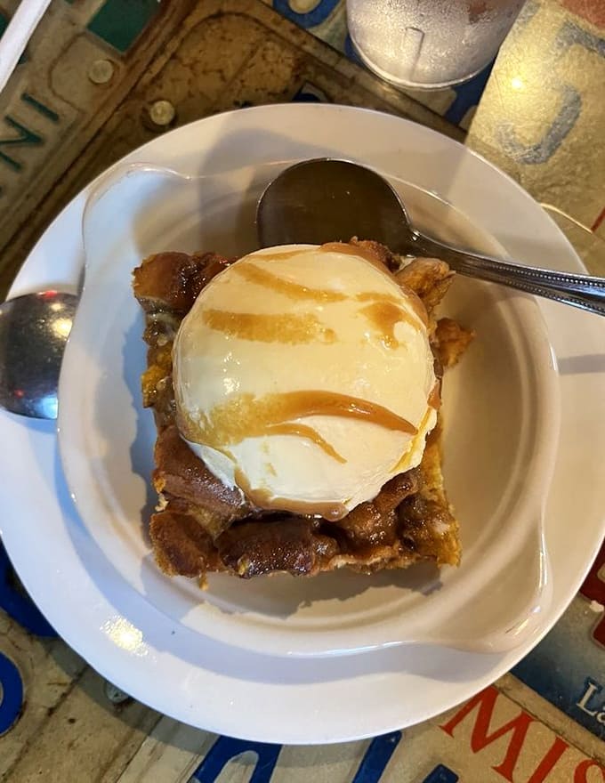 Cinnamon roll bread pudding topped with ice cream is basically a warm hug in dessert form, and yes, you need it.