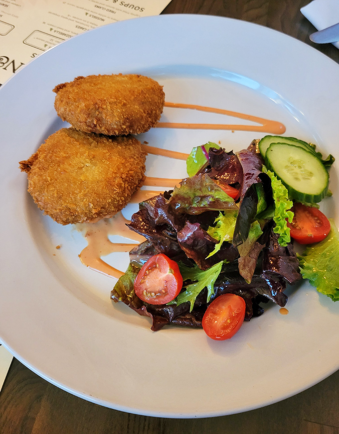 Golden-fried treasures that actually taste like crab &ndash; these aren't your typical breadcrumb-heavy disappointments, but genuine celebrations of Maine's sweet crustaceans.