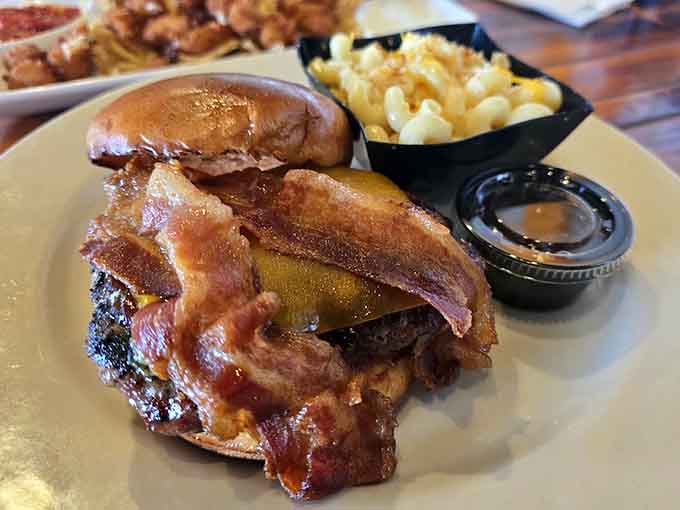 This burger stacked with bacon demonstrates the restaurant's commitment to not holding back on the good stuff ever.