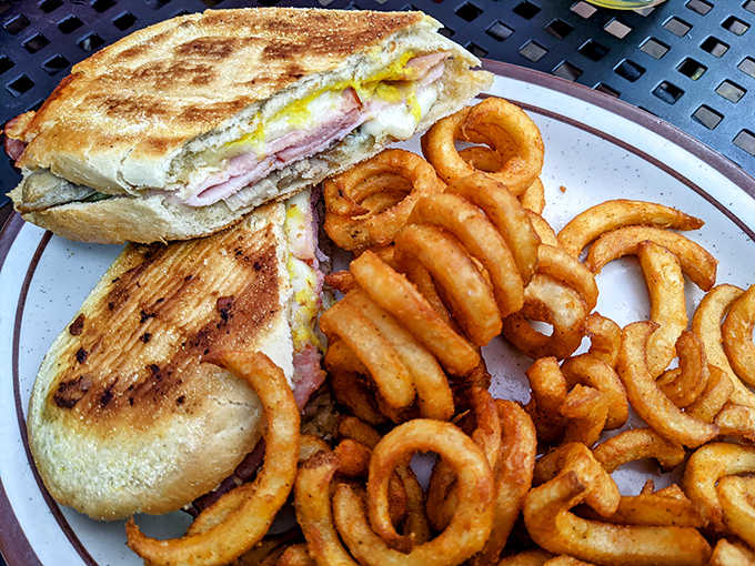 Ham, Swiss, pickles, and mustard pressed between bread until everything melds into a harmonious whole that would make Havana proud.