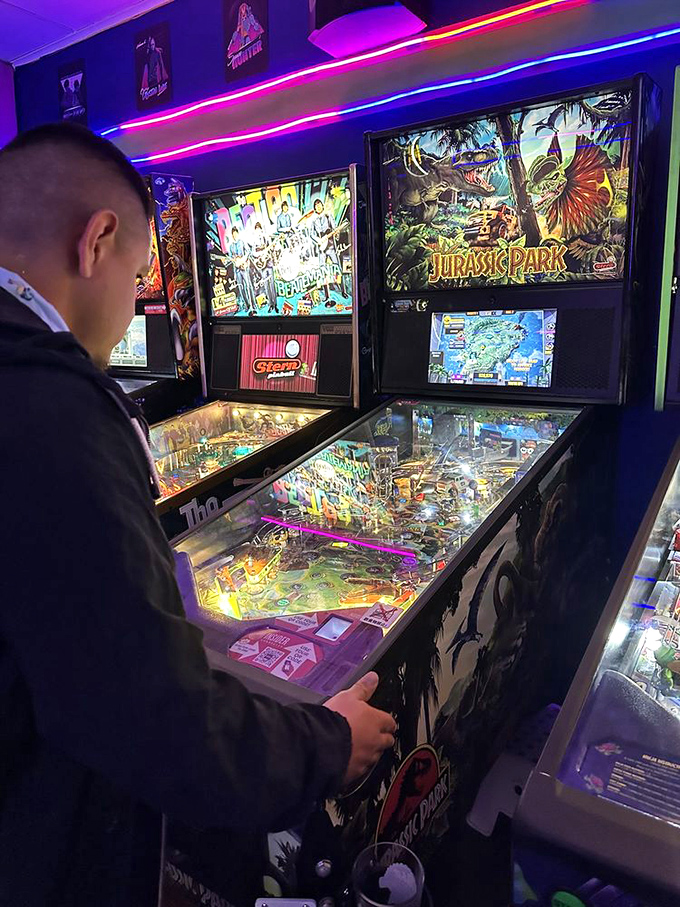 Concentration etches across the player's face as flippers click and lights flash &ndash; pinball isn't just a game, it's a full-body experience.