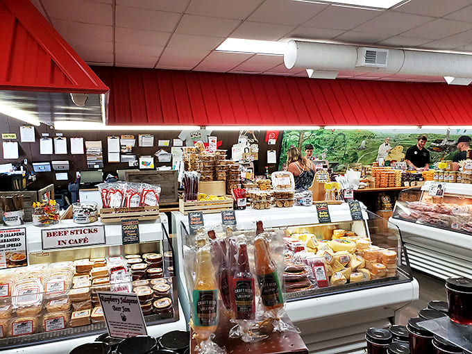 The deli counter showcases meats that make ordinary sandwiches hang their heads in shame, perfect partners for the cheese selection nearby.