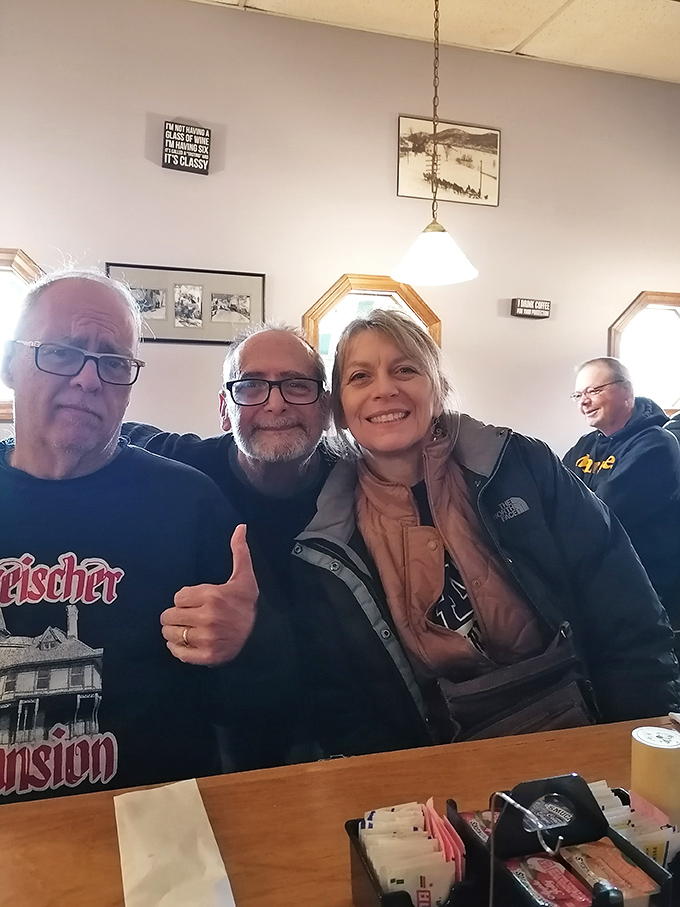 Happy diners giving the universal sign of approval &ndash; when the food is this good, thumbs up is just the beginning of the praise.