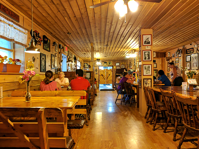 Every inch of wall space tells a story – photographs, memorabilia, and the collected history of a restaurant that's become community cornerstone.