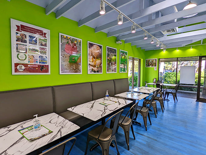 The bright dining area with lime-green walls and marble-topped tables offers the perfect backdrop for ice cream appreciation ceremonies.