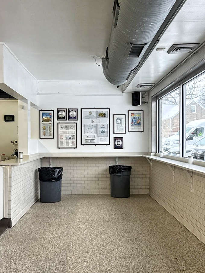 The standing-room-only dining area forces a beautiful democracy &ndash; CEOs and construction workers shoulder-to-shoulder, united by excellent hot dogs.