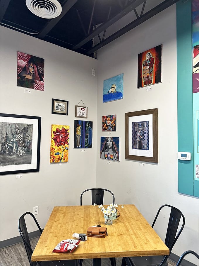 Every wall tells a story through carefully curated local artwork, creating a dining atmosphere that feeds both stomach and soul.