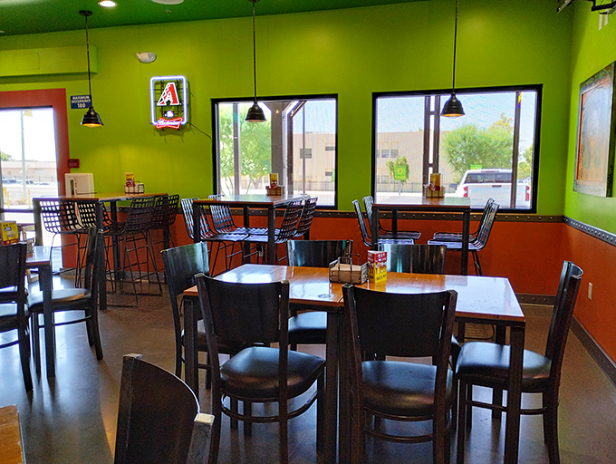 The green and orange dining area offers a more subdued but equally vibrant space to enjoy your feast &ndash; Arizona sports fans might spot a familiar logo.