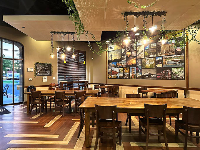 Herringbone floors lead through a thoughtfully designed space where wooden tables invite conversations that could last hours or quick coffee breaks.