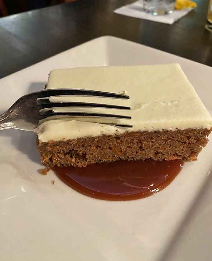 That carrot cake with cream cheese frosting is the sweet ending your meal deserves, rich without being overwhelming.