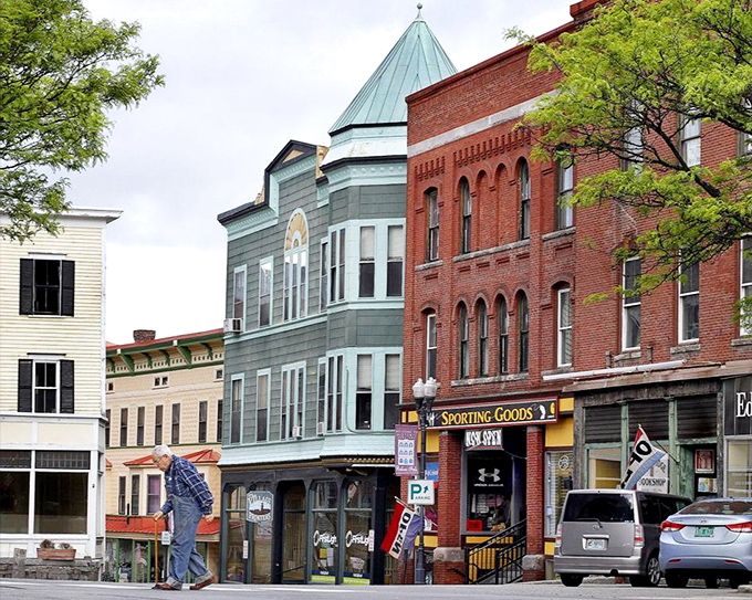 Downtown Bellows Falls comes alive with golden light in the evening, creating a warm, inviting atmosphere.