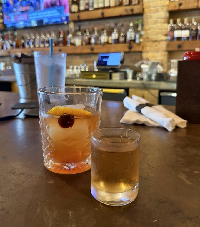 Liquid companions for your barbecue journey—one crafted cocktail and one honest pour, both promising to enhance every smoky bite.