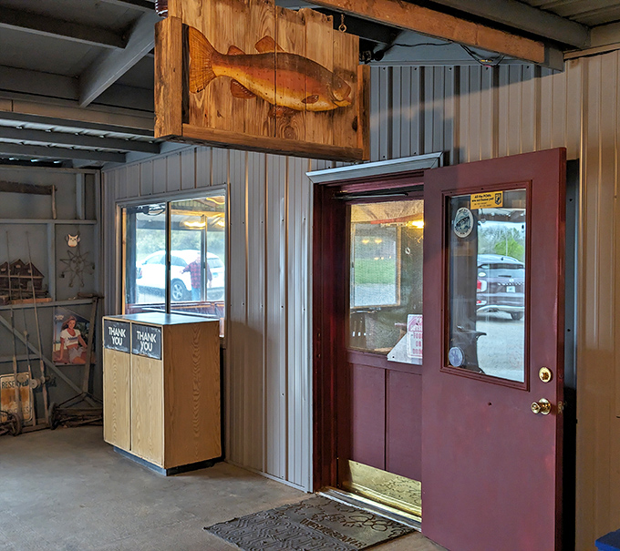 A wooden fish signals you've arrived at the promised land. This unassuming entryway is the gateway to Southern Illinois fish paradise.