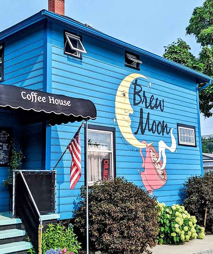 Brew Moon's vibrant blue exterior and whimsical moon artwork promise coffee experiences that are anything but ordinary.