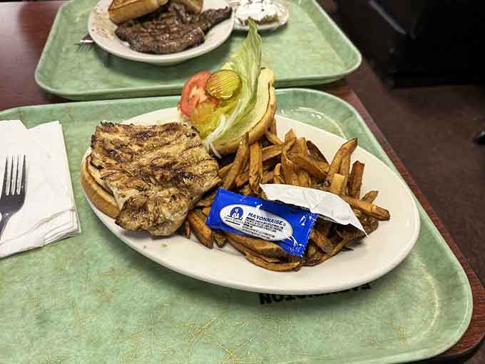 The chicken sandwich with perfectly seasoned fries shows that poultry gets just as much love and attention as the beef here.