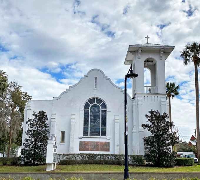 This pristine white Methodist church stands as a reminder that Sunday best once meant architecture too, not just clothing.