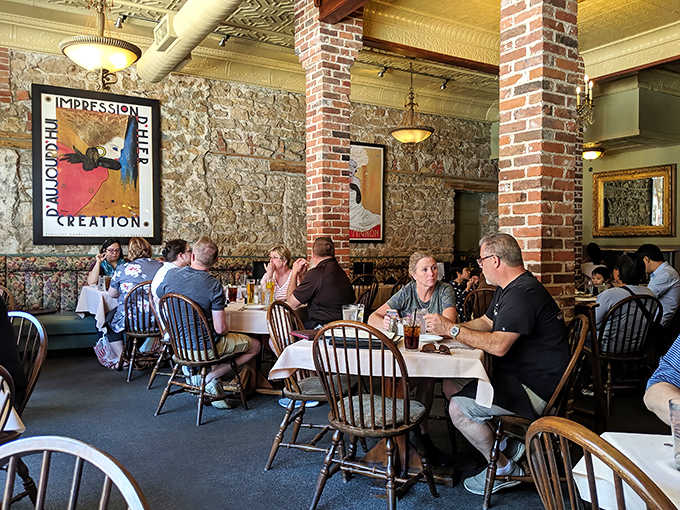 Happy patrons gather in this stone-walled sanctuary, where Italian flavors and Midwestern hospitality create memorable moments.