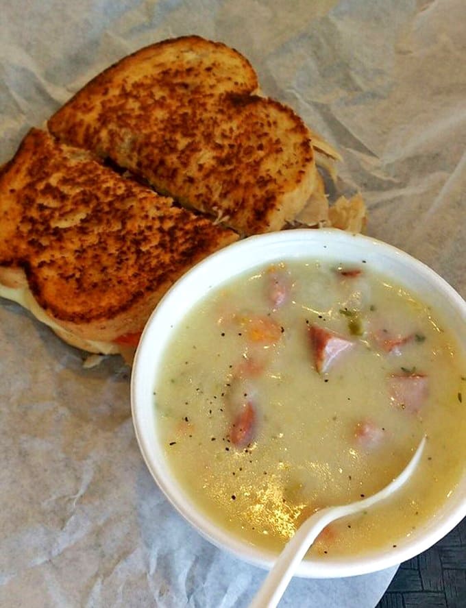 The ultimate comfort duo: a perfectly grilled sandwich alongside Polish potato soup that could warm the coldest Minnesota winter day.