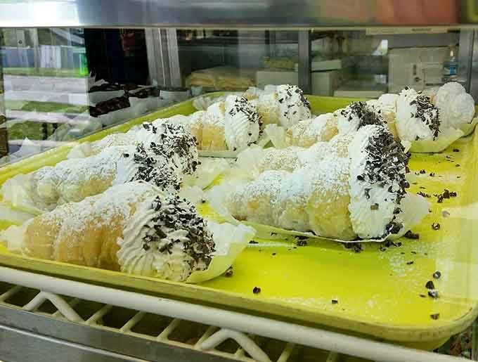Cream horns dusted with powdered sugar offer a lighter, flakier alternative when you want elegance with your indulgence.