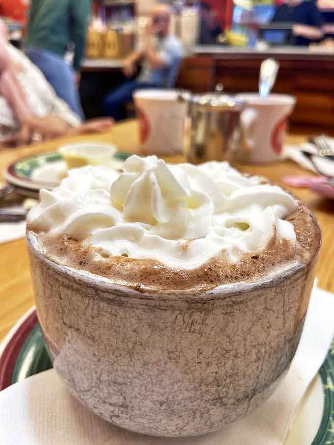 Hot chocolate that doesn't just warm your hands but your soul. Those tiny bubbles are whispering sweet nothings to your taste buds.