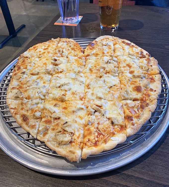 Heart-shaped pizza proves they put love into everything, even the shape of your dinner.